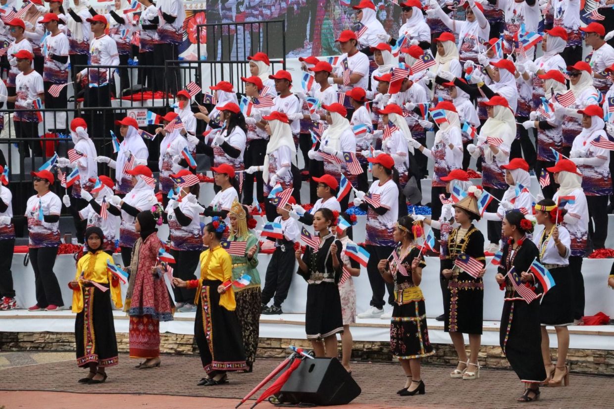Thousands join National Day and first Sabah Day parade in KK | The Star