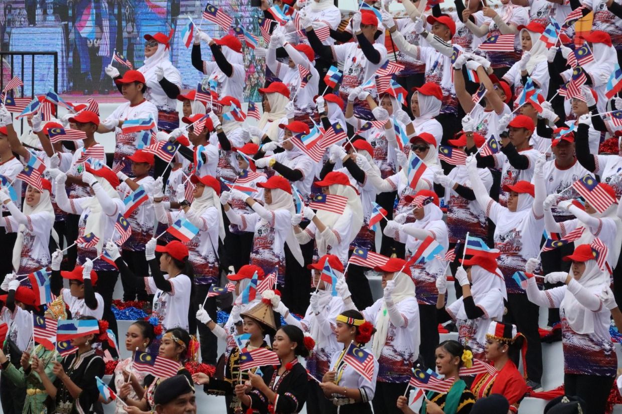Thousands join National Day and first Sabah Day parade in KK | The Star