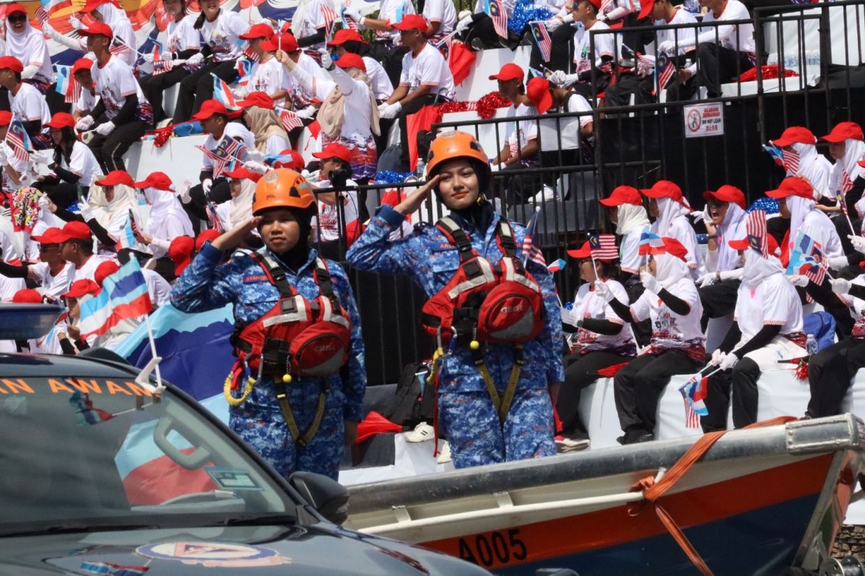 Thousands join National Day and first Sabah Day parade in KK | The Star