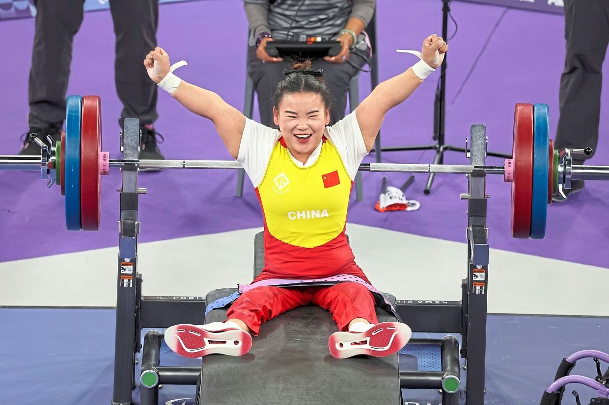 Other Sports: China shine in powerlifting as Lingling betters own world ...