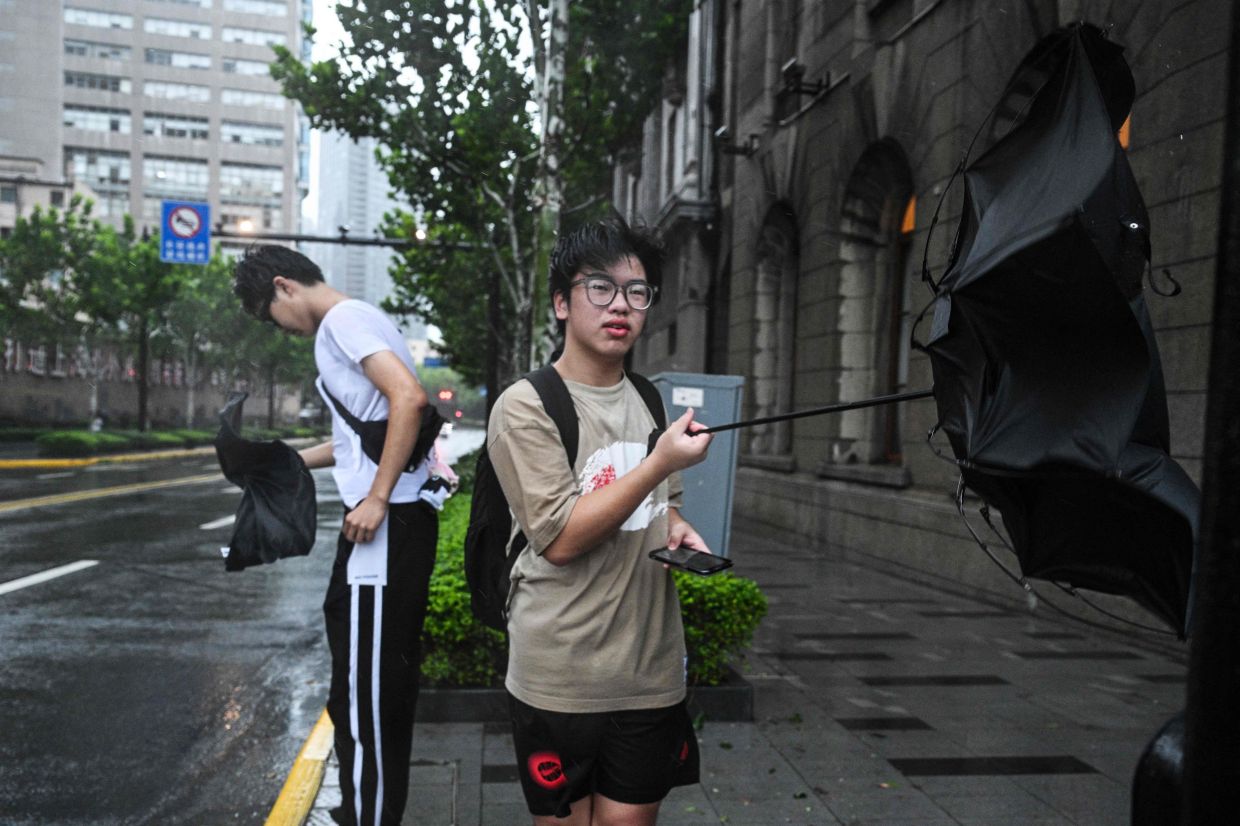 Typhoon Bebinca lands in Shanghai, strongest storm to hit city since ...