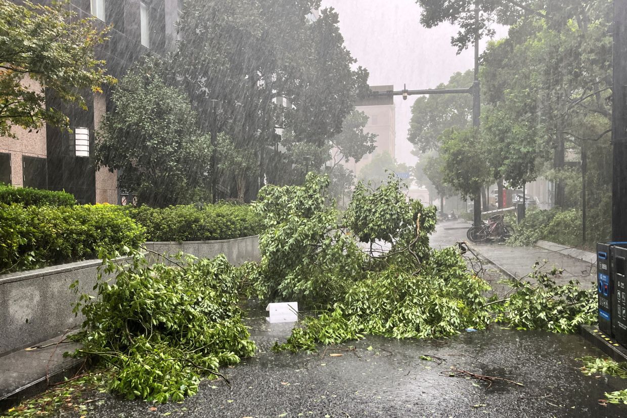 China's megacity and economic force Shanghai shuts down; Typhoon ...