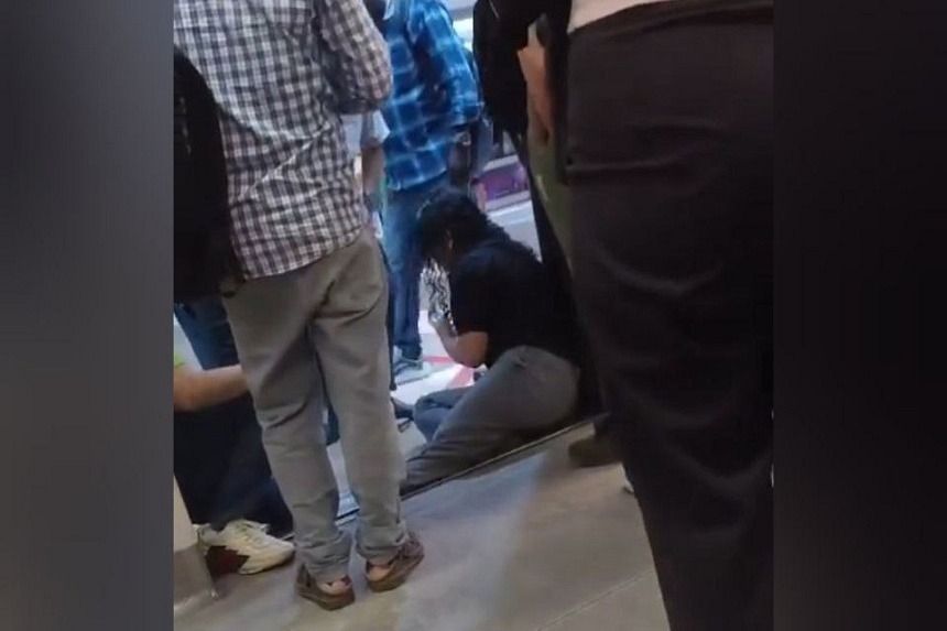 Woman rescued after getting leg stuck in platform gap at Bugis MRT ...