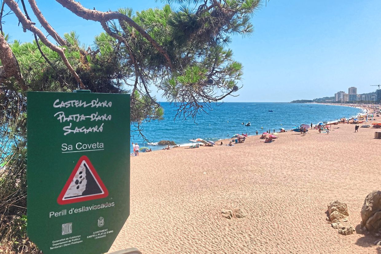 As its beaches disappear, Spanish town takes drastic action to stop ...