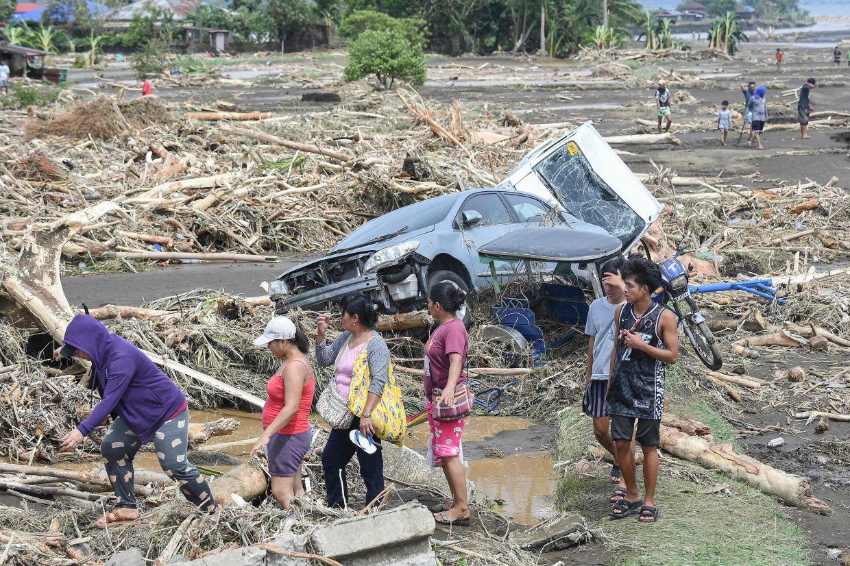 Tropical storm Trami leaves towns submerged, 66 dead in Philippines ...