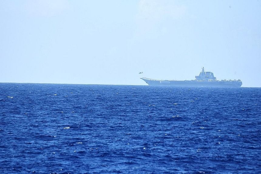 China's PLA navy perform first dual aircraft formation exercise in ...