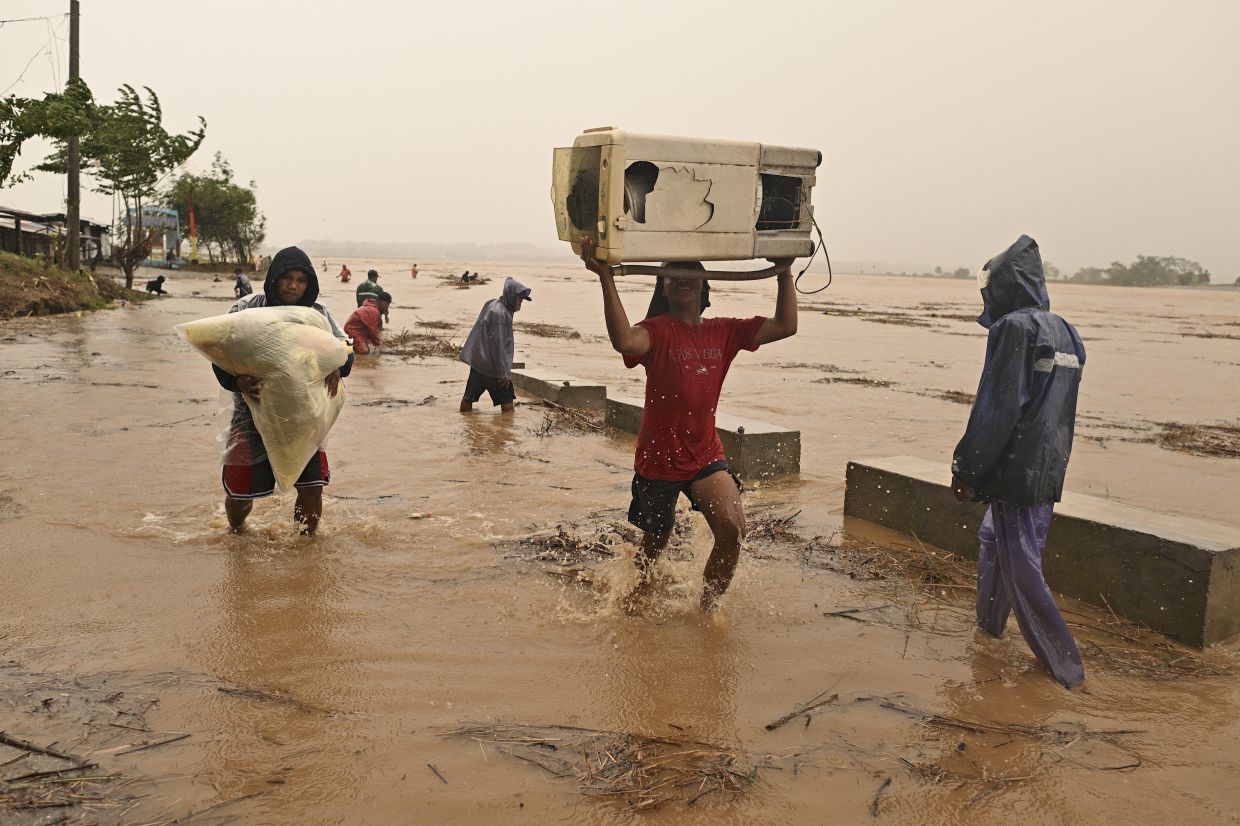 Thousands flee as fourth major storm in a month lands and hits ...