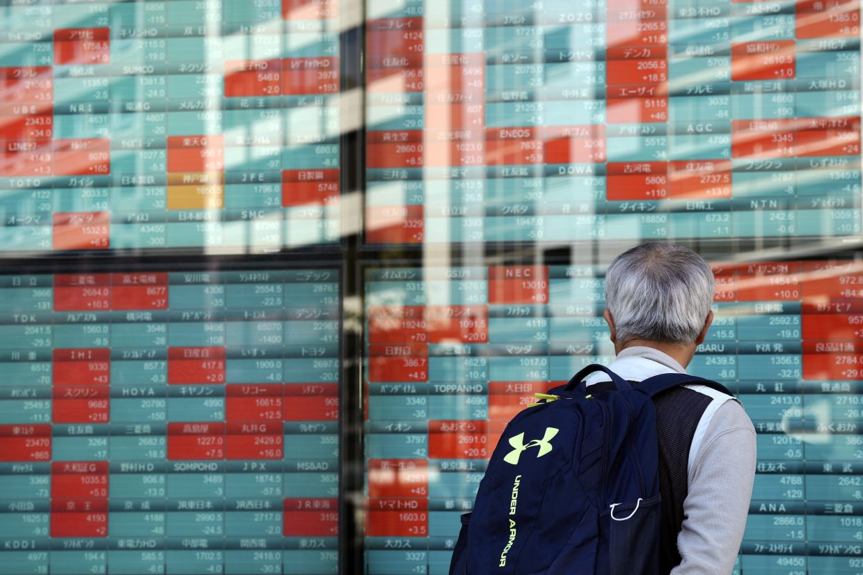 Asian markets mixed as traders weigh Fed; bitcoin above US$90,000 | The ...