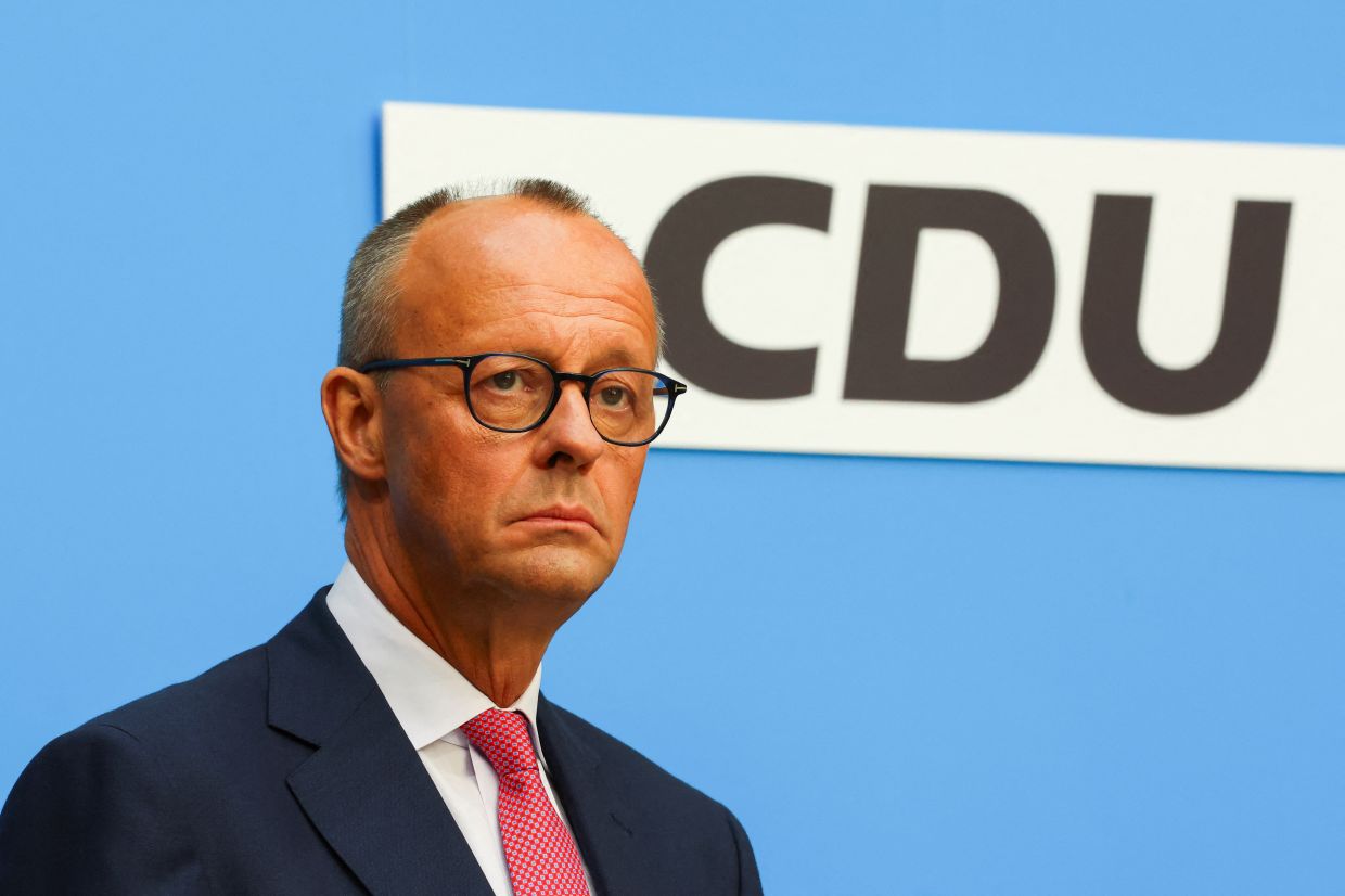 Germany’s would-be leader promises growth | The Star