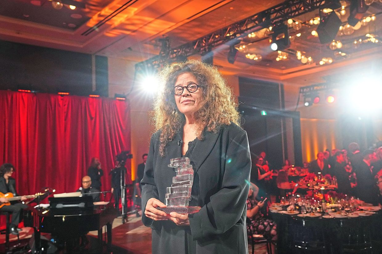 Poet-novelist Anne Michaels wins Giller Prize for her novel 'Held ...