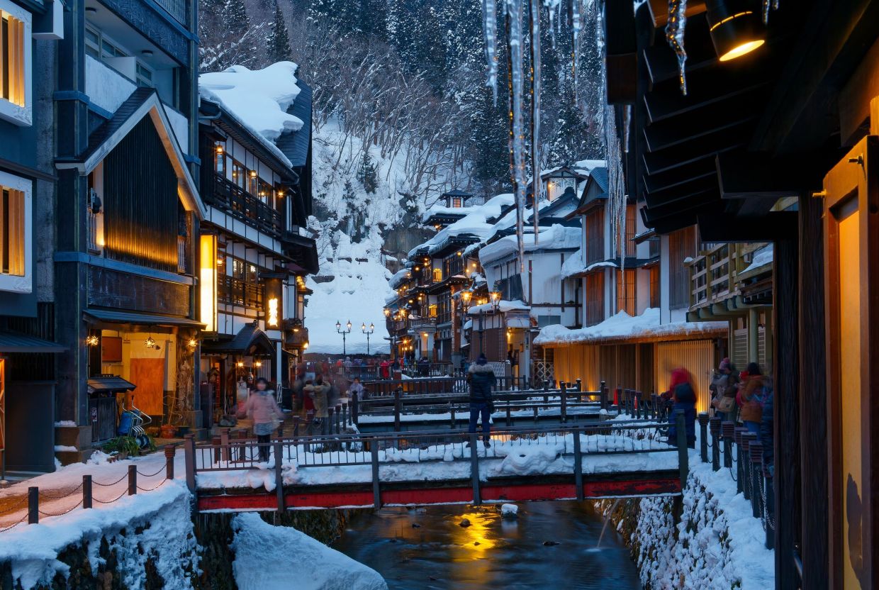 Picturesque Japan hot spring town limits day trippers to tackle ...