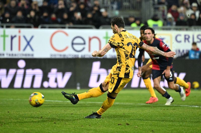 Football: Soccer-Inter dispatch Cagliari 3-0 to keep pace at Serie A ...