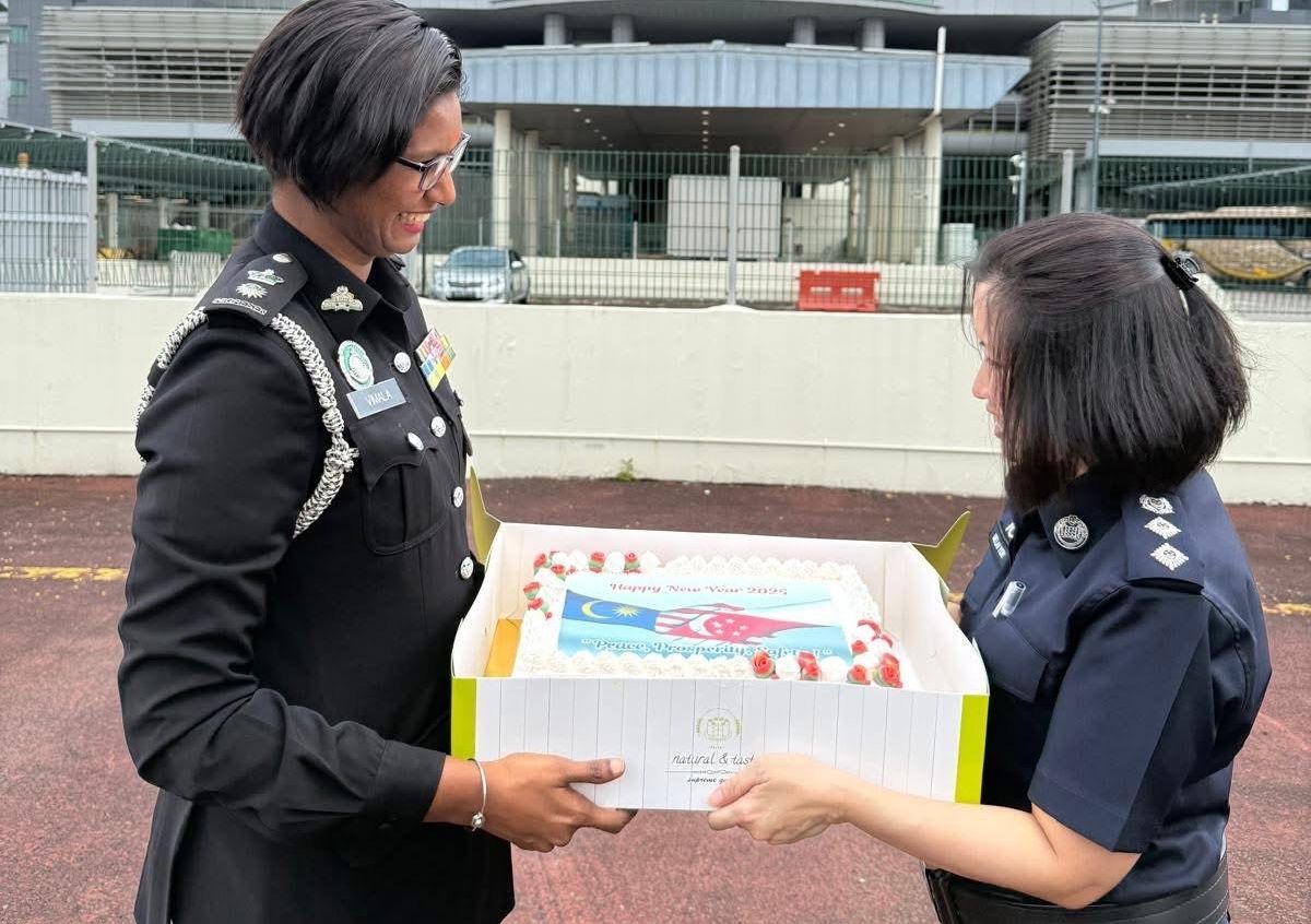 Sweet gesture: BSI Immigration treats Singapore ICA to cake for New ...