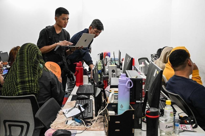 Philippine police arrest over 450 in 'Chinese-run' scam centre raid ...