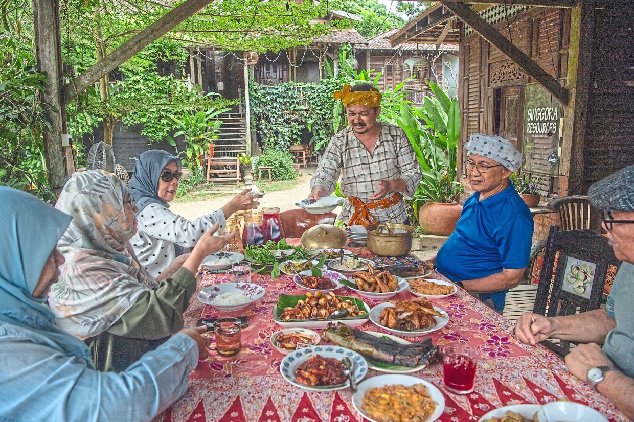 Ex-engineer uses reclaimed wood to build dream home | The Star