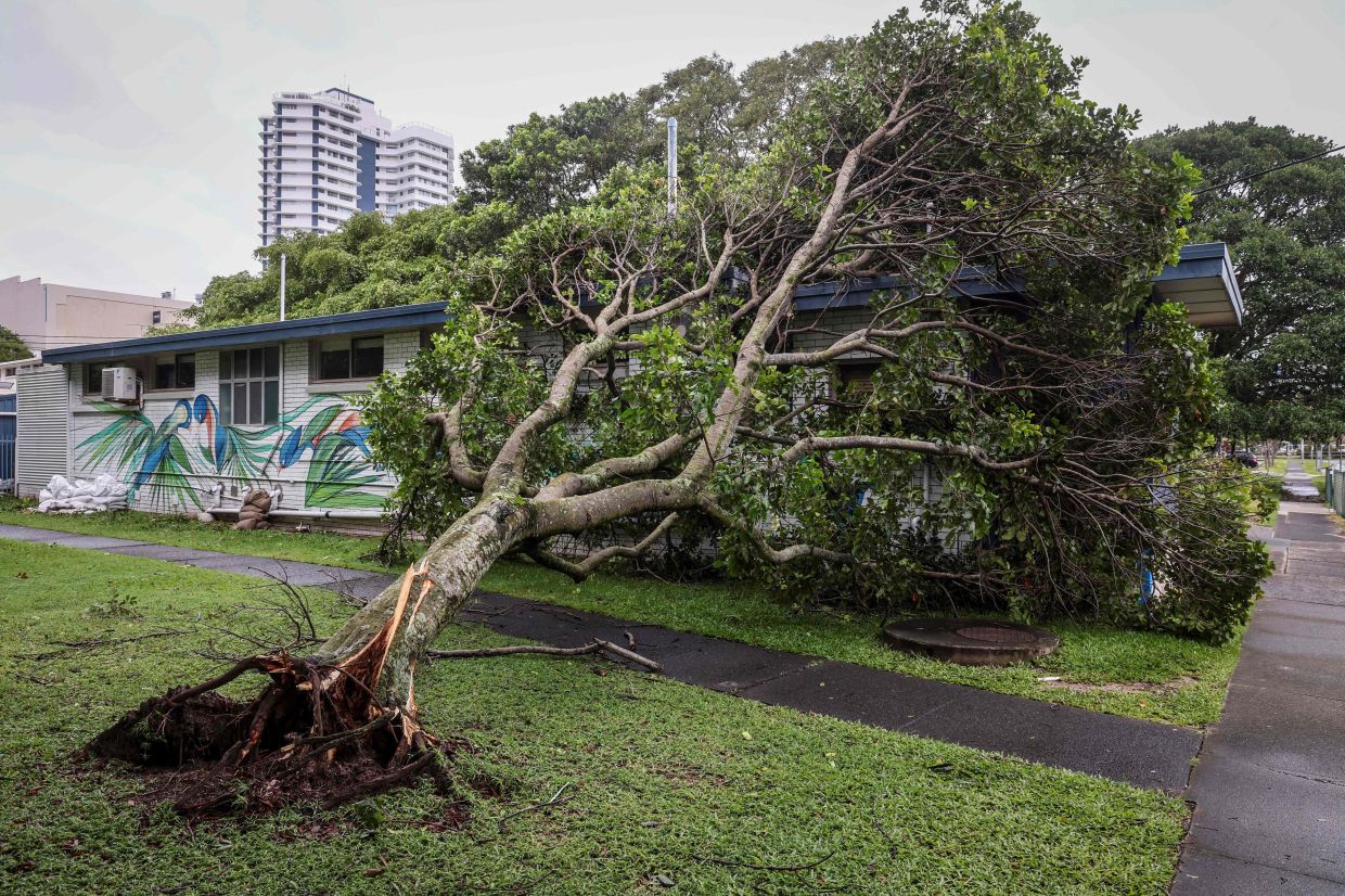 Cyclone Alfred downgraded as millions of Australians stay indoors | The ...