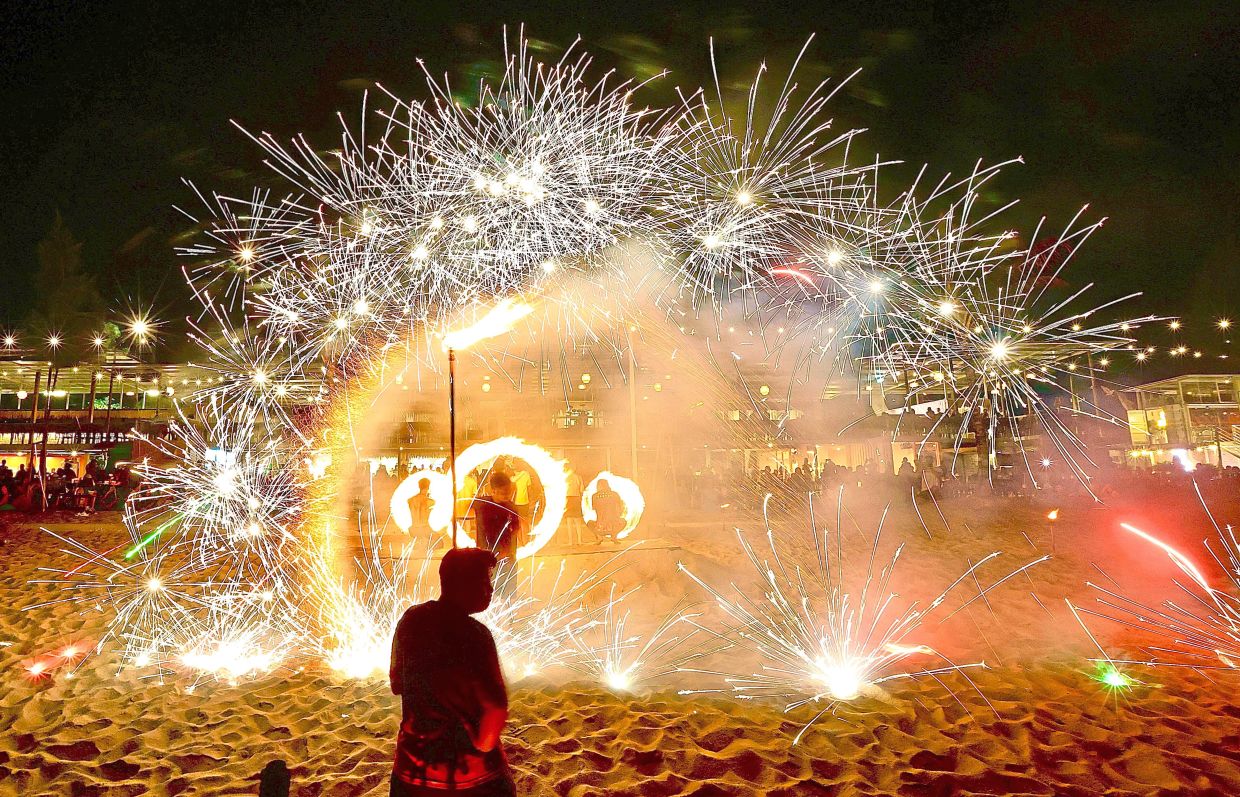 Fiery display sets Batu Ferringhi alight | The Star