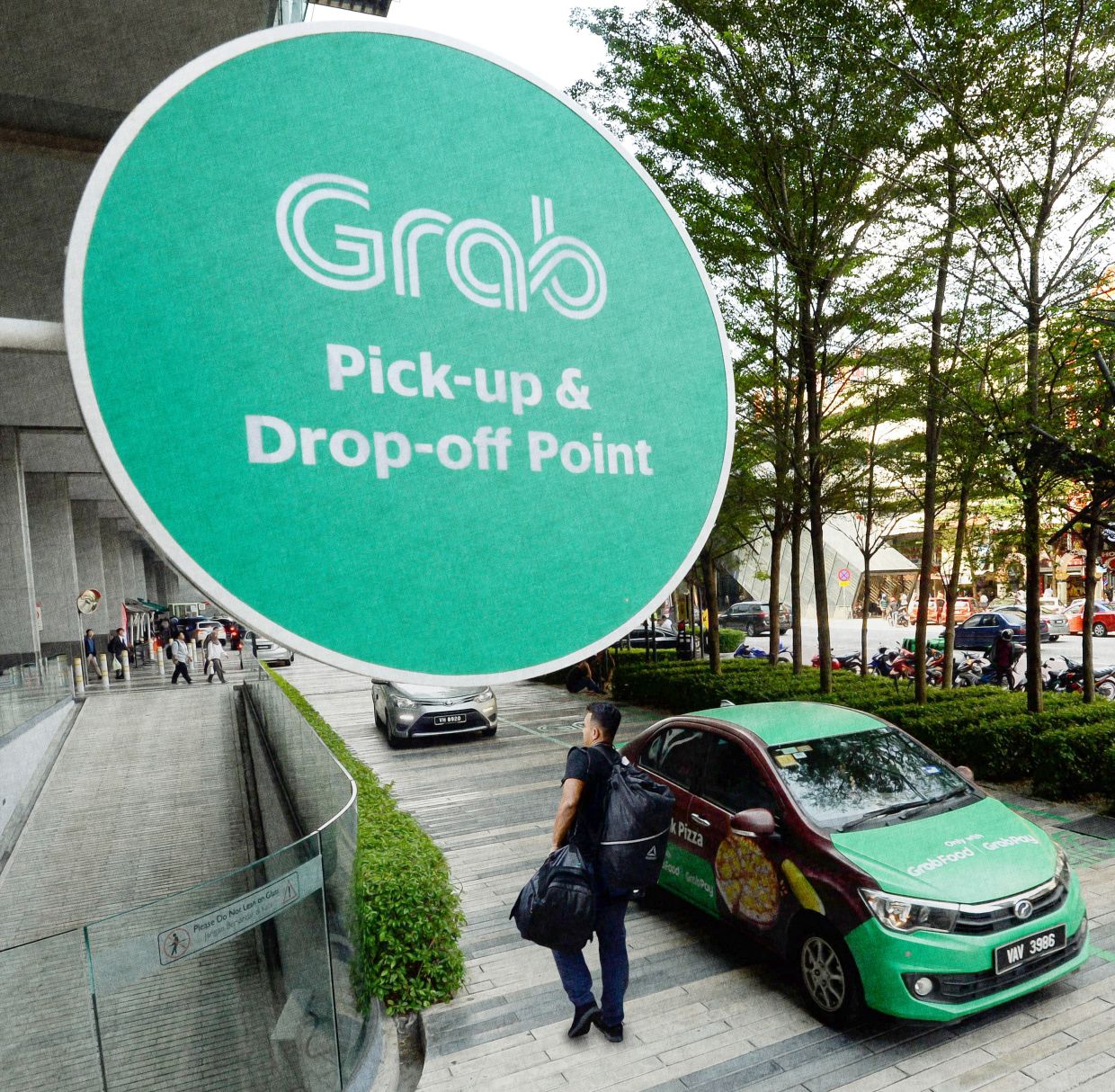 Grab enters Singapore motor insurance market | The Star