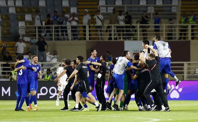 Football: Soccer-Uzbekistan savour sweet taste of success after sealing ...