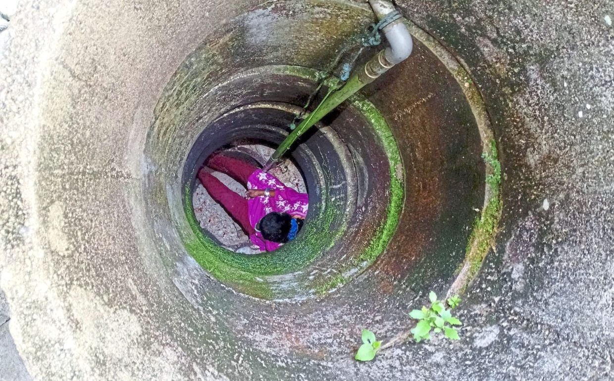 Woman rescued after falling into well | The Star