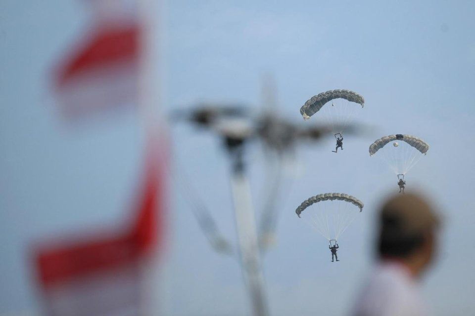 Red Lions and naval divers join forces for Jump of Unity at Singapore's ...