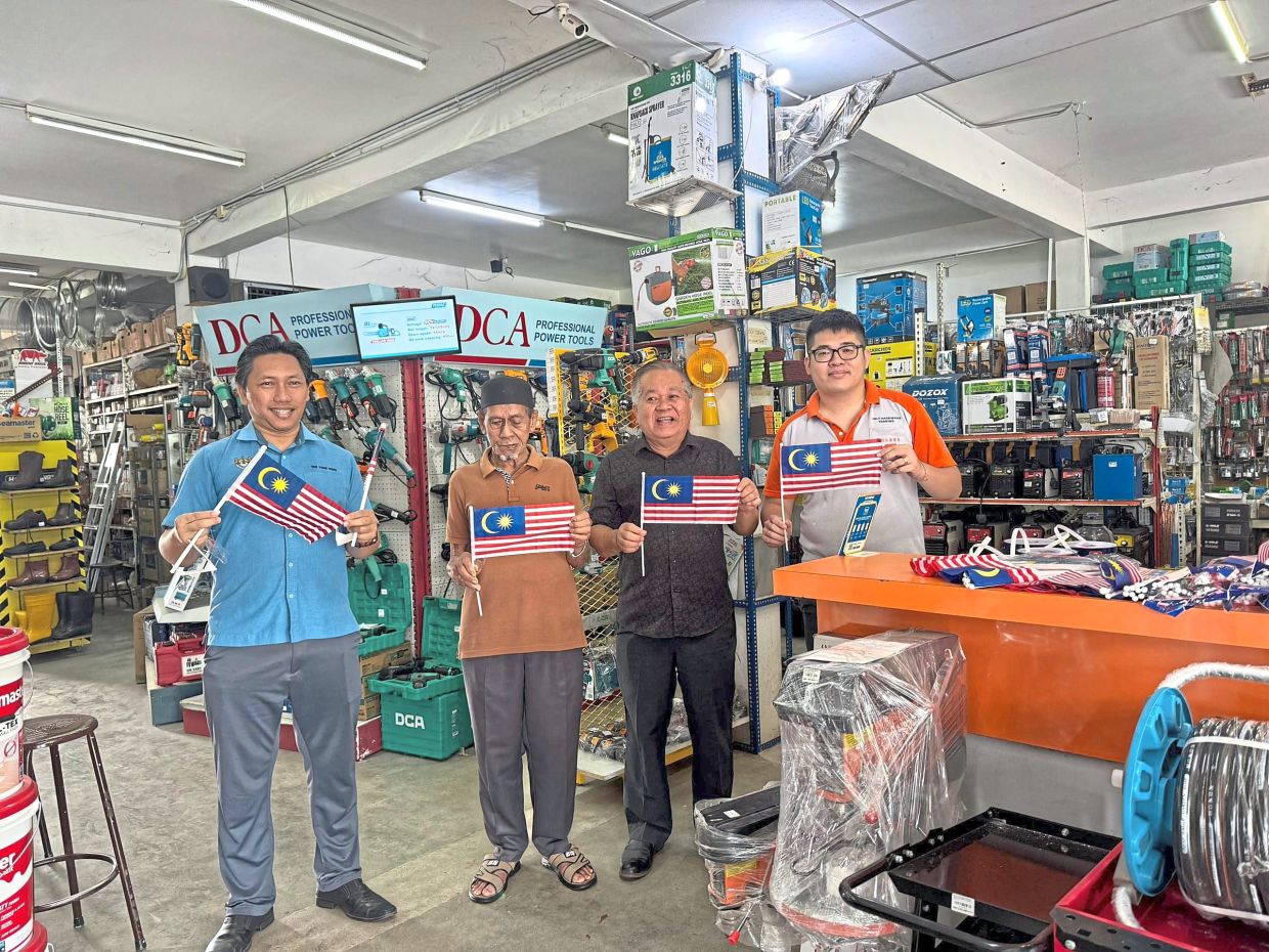 Shop in flag row reopens to slow trade | The Star