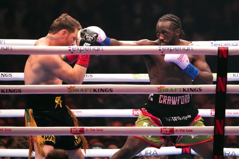 Boxing: Boxing-Crawford conquers Alvarez to become undisputed super ...