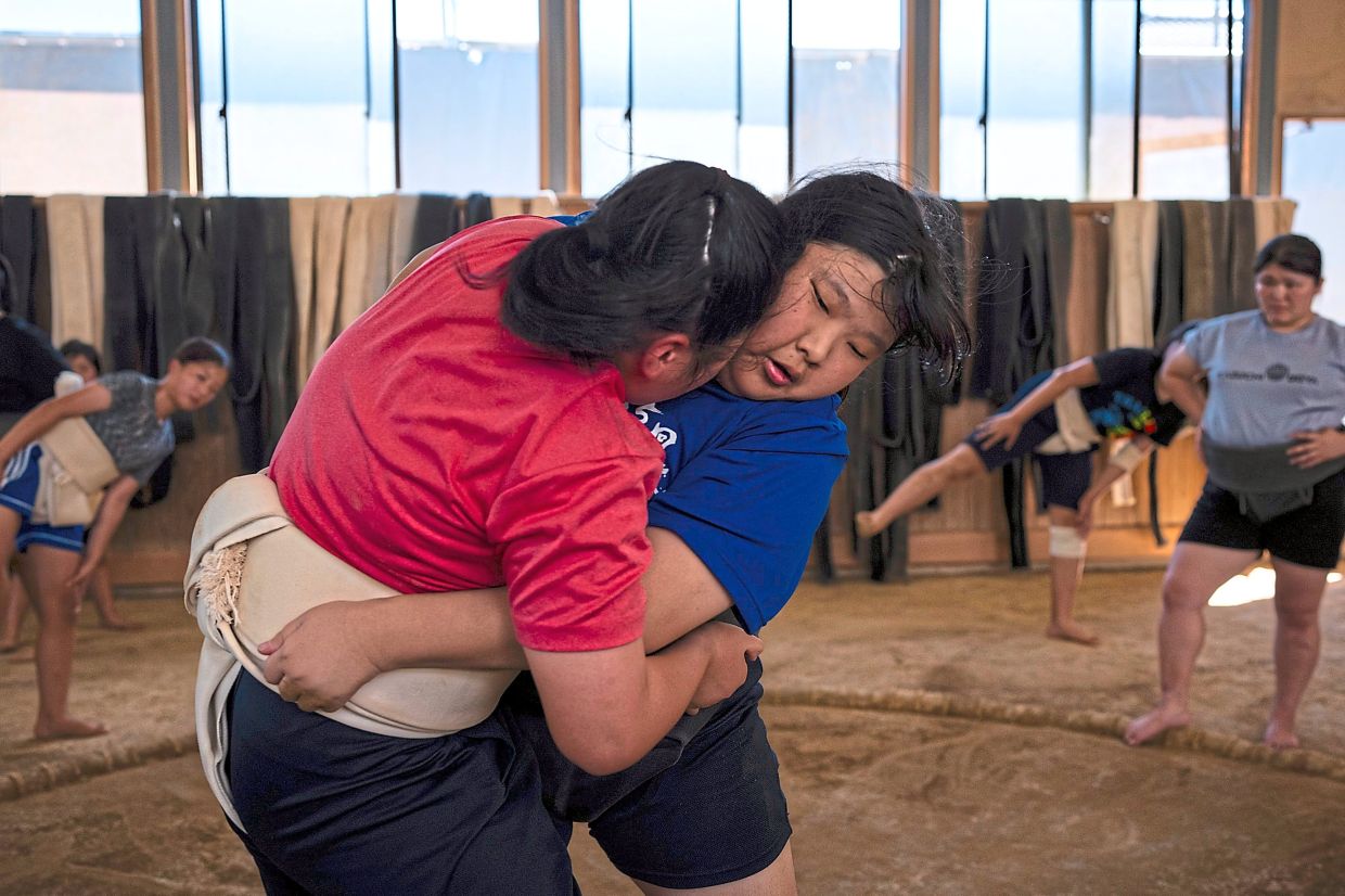 Young Japanese women are taking up sumo, sparking a change in the sport ...