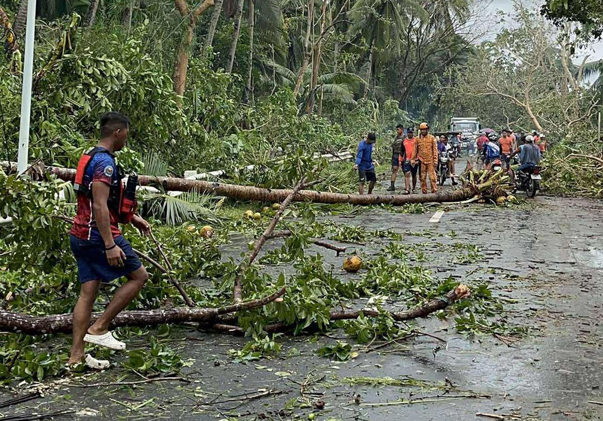 Death toll in Philippine typhoons climbs to 27, 16 missing | The Star