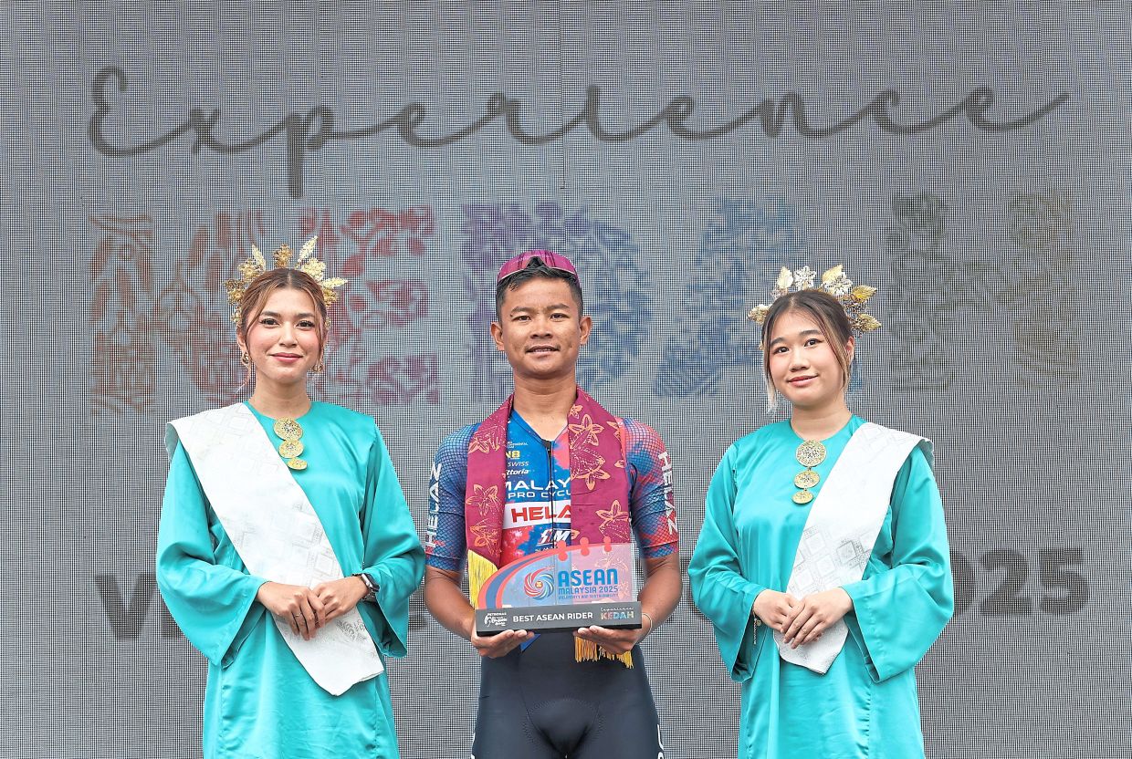 Cycling: TSG rider Harrif’s kind act earns heavy UCI penalty | The Star