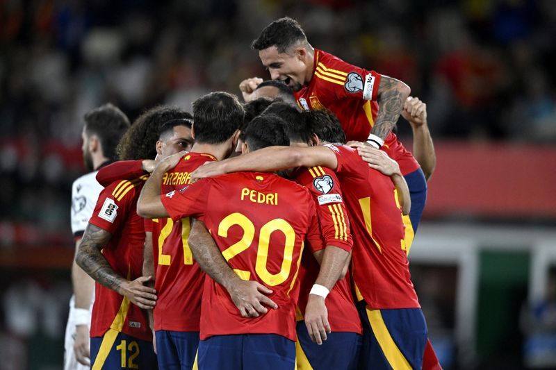Football: Soccer-Spain beat Georgia 2-0 to edge closer to World Cup ...