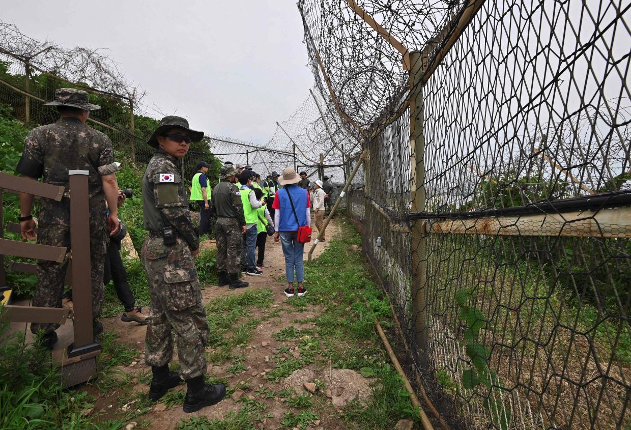 South Korea halts tours in parts of DMZ ahead of Trump visit | The Star