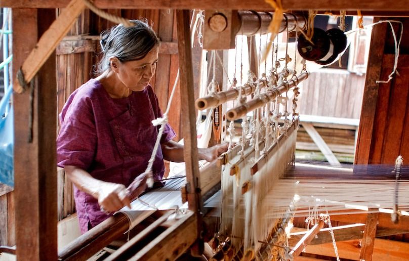 With patient hands, Myanmar's Inthas weave lotus fibers into the world ...