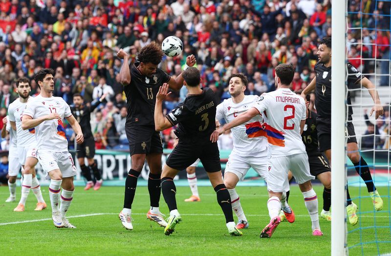 Football: Soccer-Portugal qualify for World Cup with 9-1 thrashing of ...