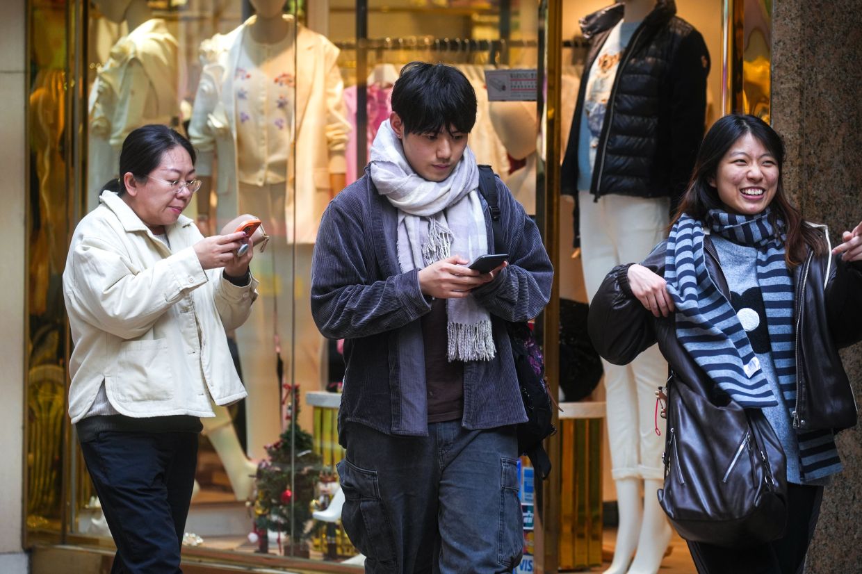 Hong Kong wakes up to coldest morning so far this winter at 12.9 ...