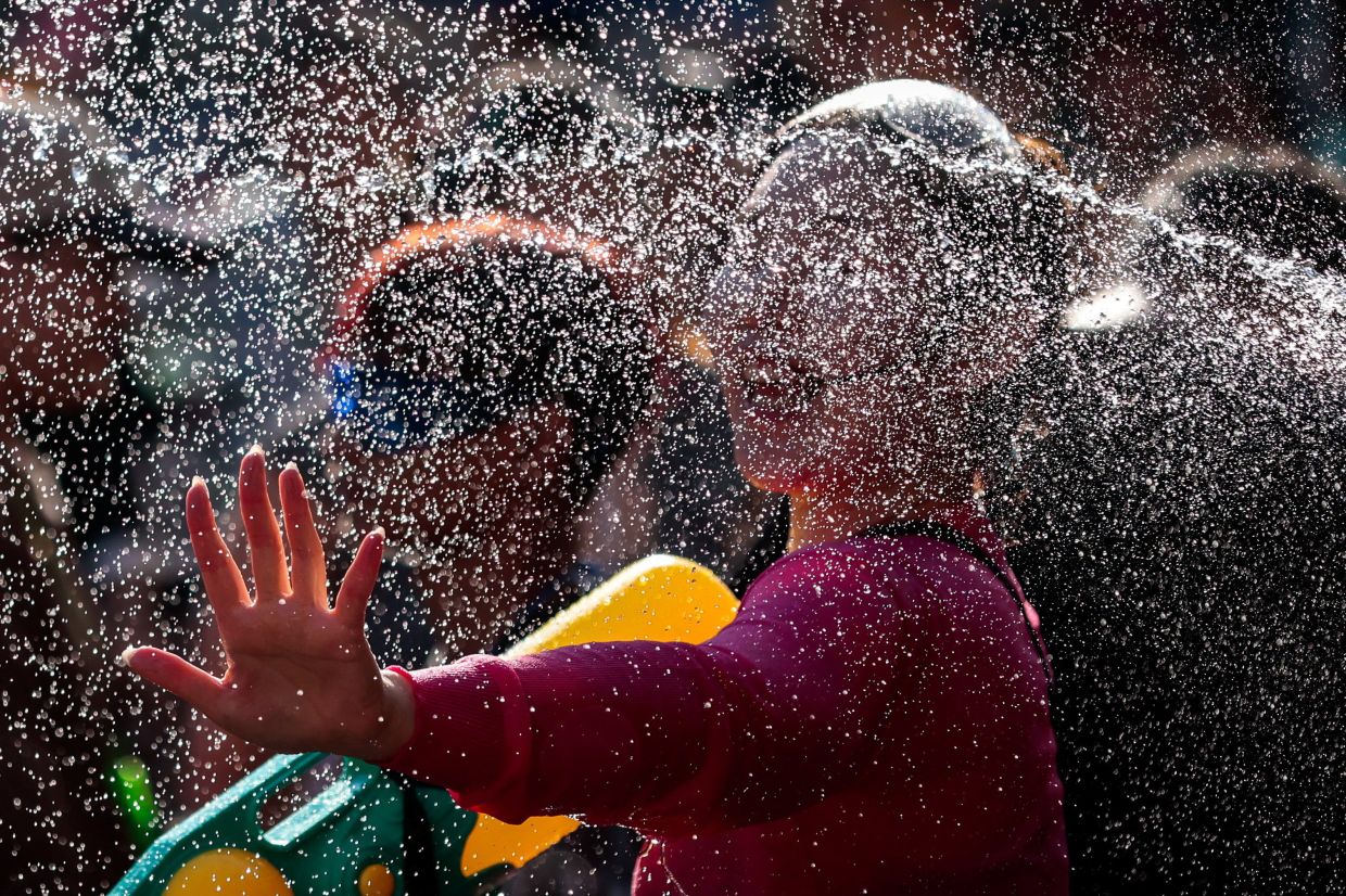 Thailand's famed Songkran festival goes full swing despite rising ...