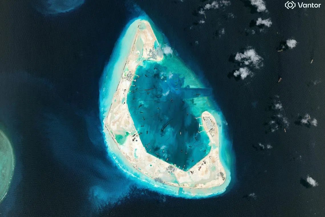Vietnam adds hundreds of acres in South China Sea island-building ...