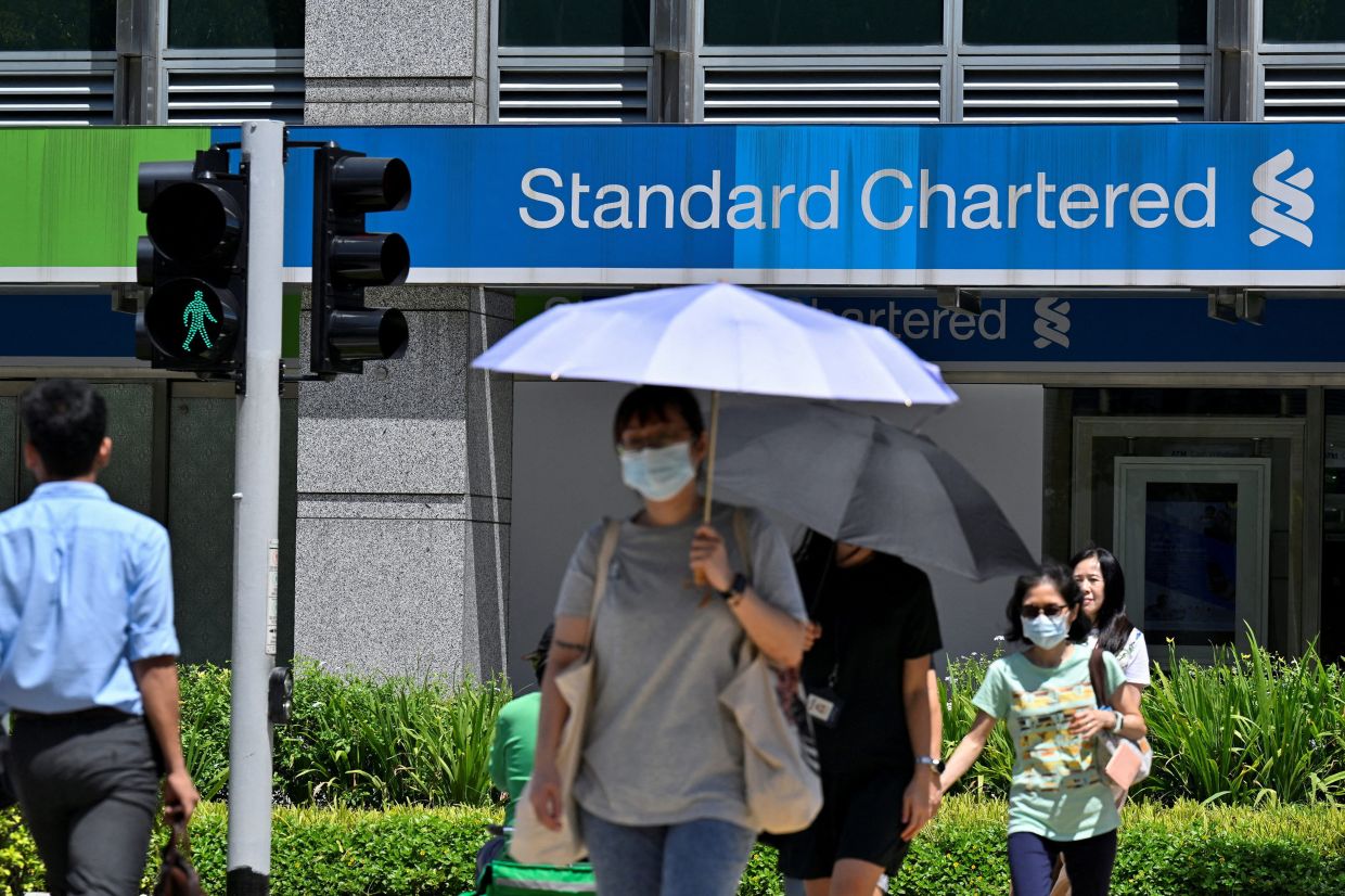 StanChart to cut more than 7,000 jobs as bank steps up AI adoption ...