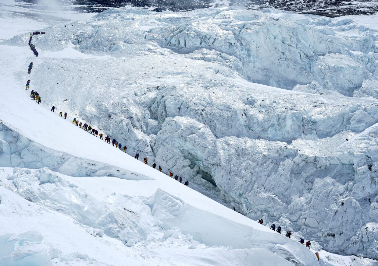 Record 274 climbers scale Mount Everest in a single day from Nepali ...