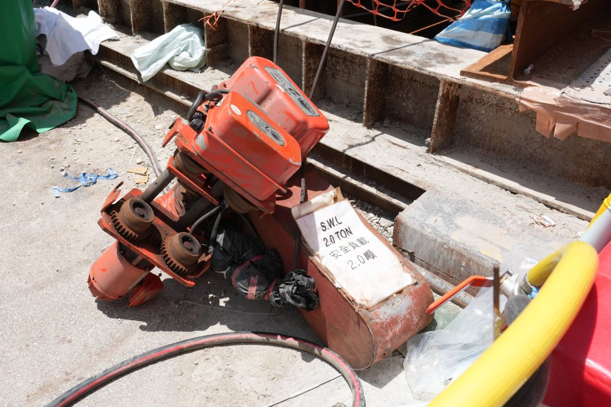 Hong Kong drainage project suspended after worker struck by chain hoist ...