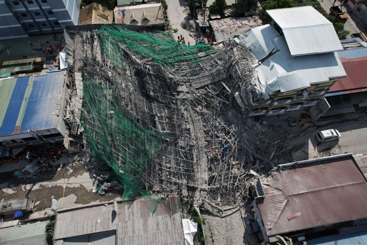 Death toll rises to 12 in under-construction building collapse in ...