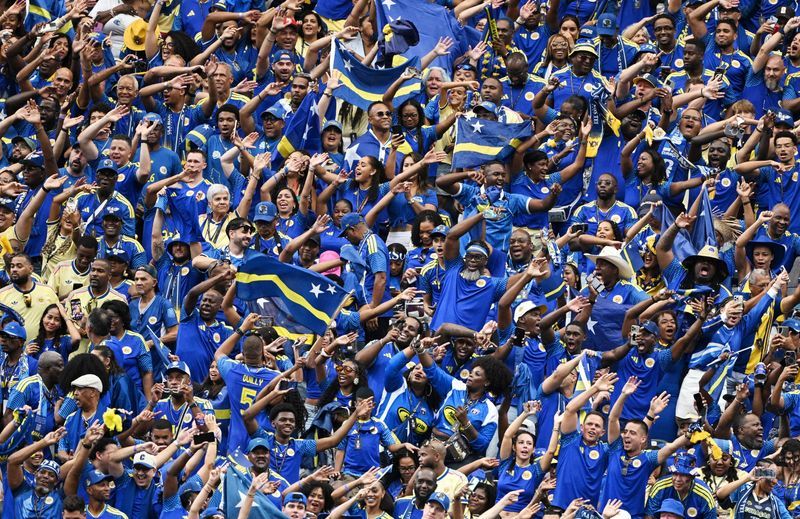 Football: Soccer-Curacao fans take heavy defeat in their stride as ...